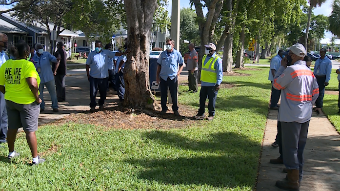 City employees demonstrate ahead of budget talks following discussion ...