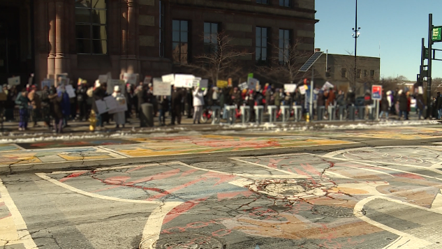 Crowd gathers outside Cincinnati City Hall to protest Trump’s executive ...