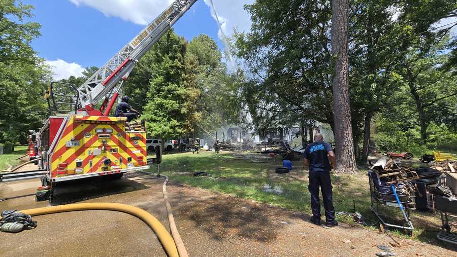 Jackson firefighter overheats while fighting house fire