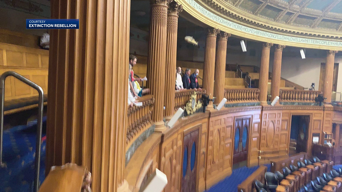 Climate protesters again descend on State House