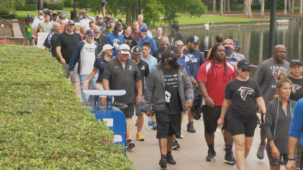 Local Coaches Unite for Coaches For Community Walk