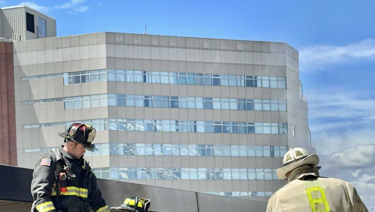 Boston firefighters extinguish fire on Commuter Rail train engine