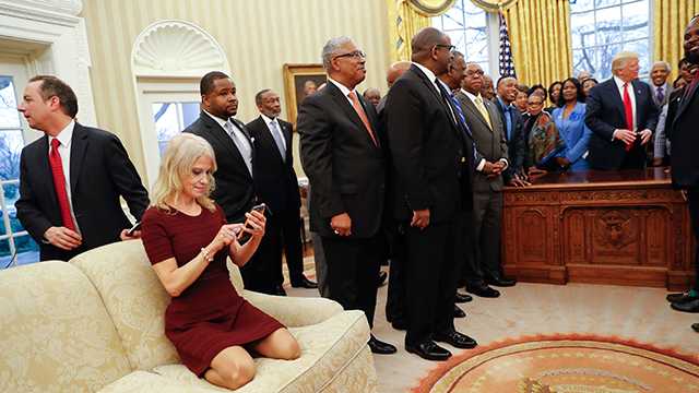 Kellyanne Conway kneels on Oval Office couch, sparks debate
