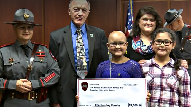 Charity run by police officers helps families with cancer-stricken children