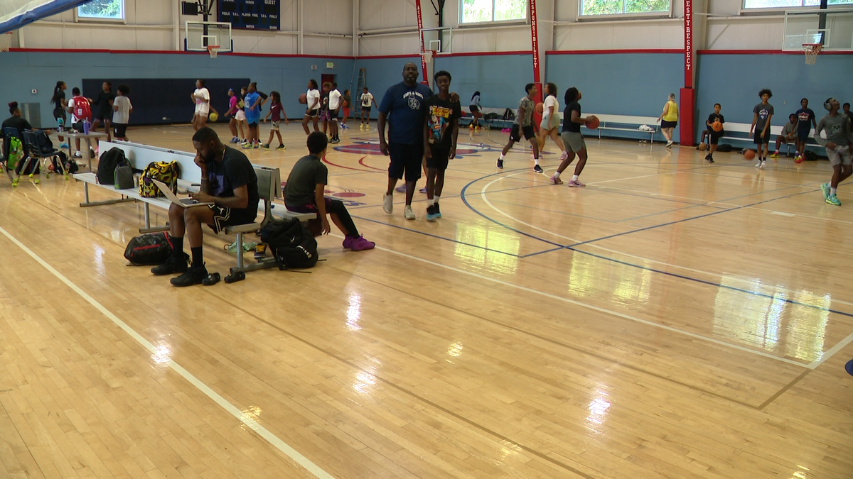 Police conduct outreach through Cops and Kids Basketball Camp