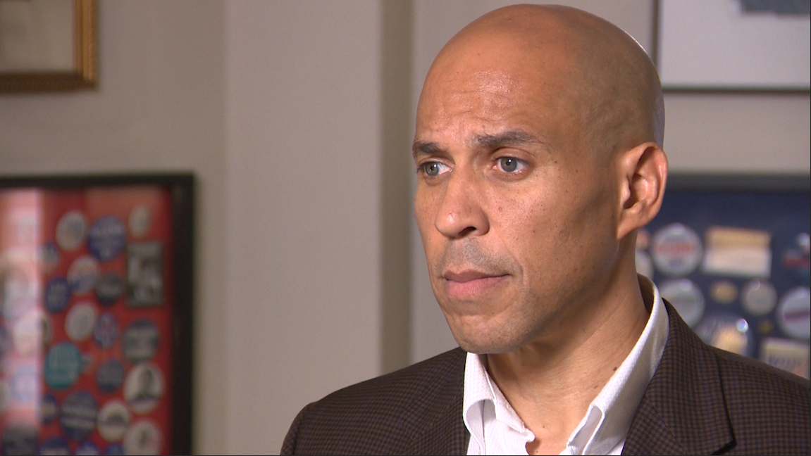 Cory Booker pushes to stay in race, while keeping eye on impeachment ...