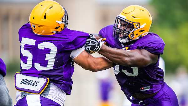 The LSU Tigers continue fall camp with another practice with shoulder pads.