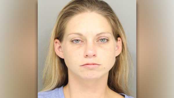 Police: Mom cooks crack in car with toddler in backseat