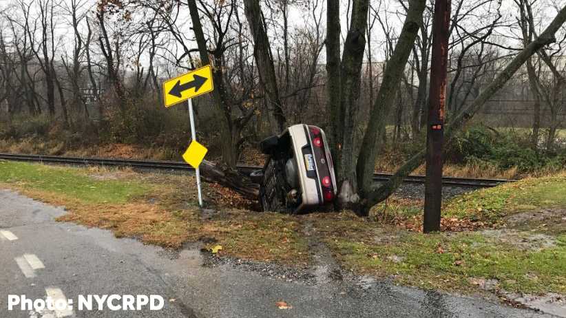Car Slides Off Road Into Ditch