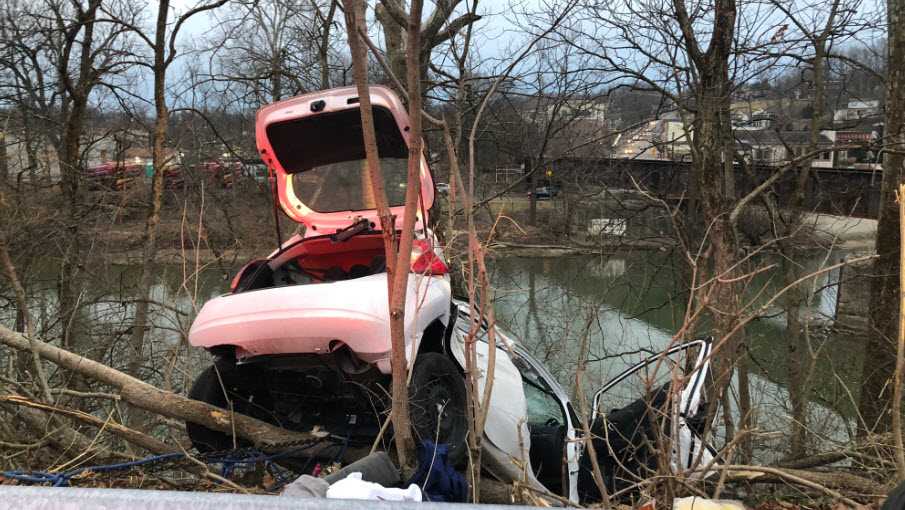 High-speed chase ends with driver trapped in car, dangling above Little ...