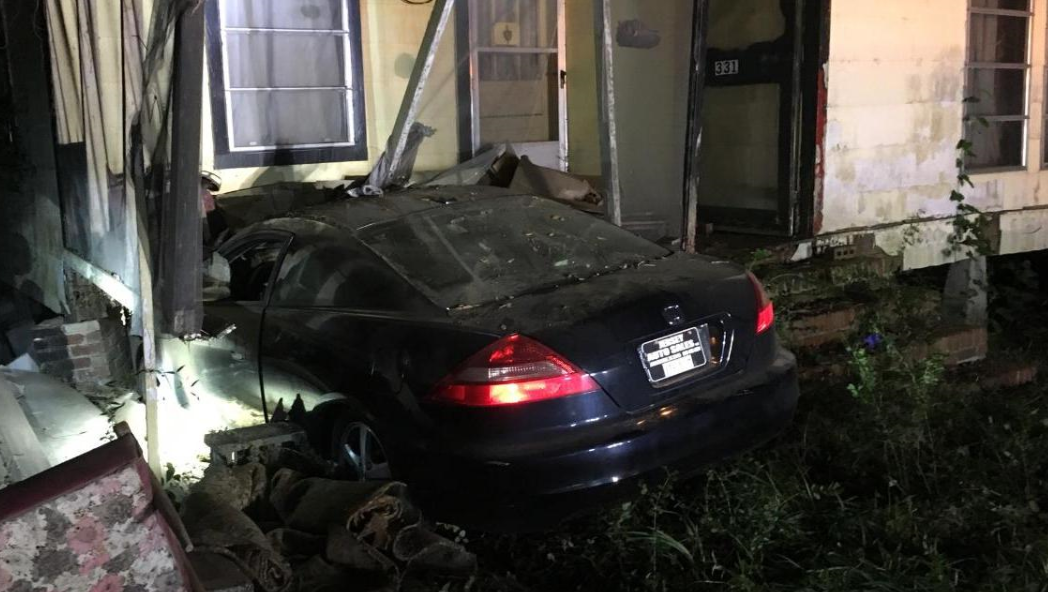 Car crashes into Burton home, driver injured Car crashes into Burton home, driver injured
