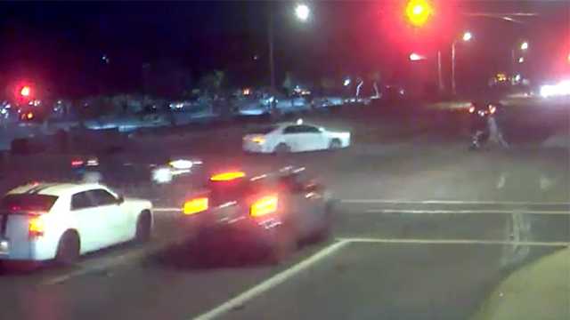 SHOCKING VIDEO: Driver runs red light, nearly striking family with stroller