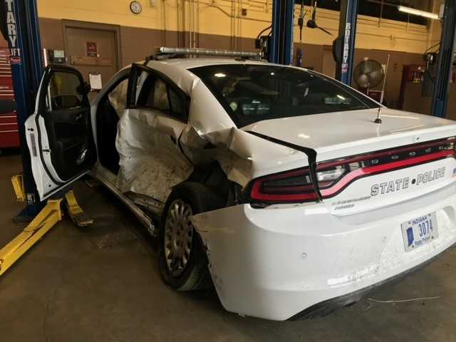 Driver cited after car rolls off trailer on I-65, hits Indiana State ...