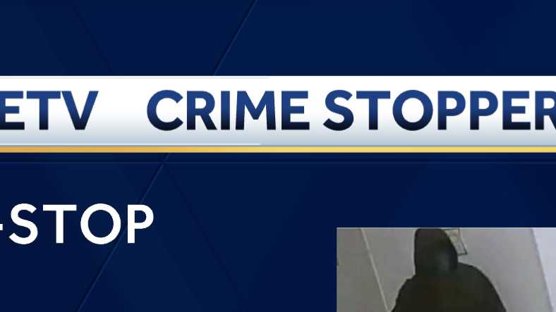 Robbery suspect uses suitcase to commit crime