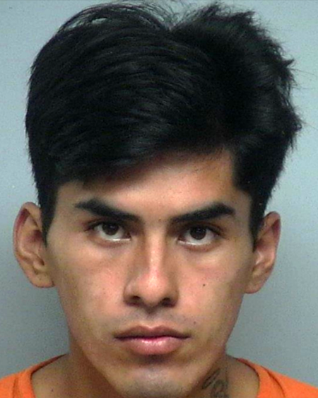 Fugitive caught at U.S. border sentenced for killing stepfather