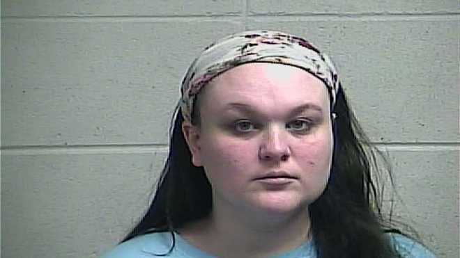 Mother arrested after infant found dead at Clinton hotel