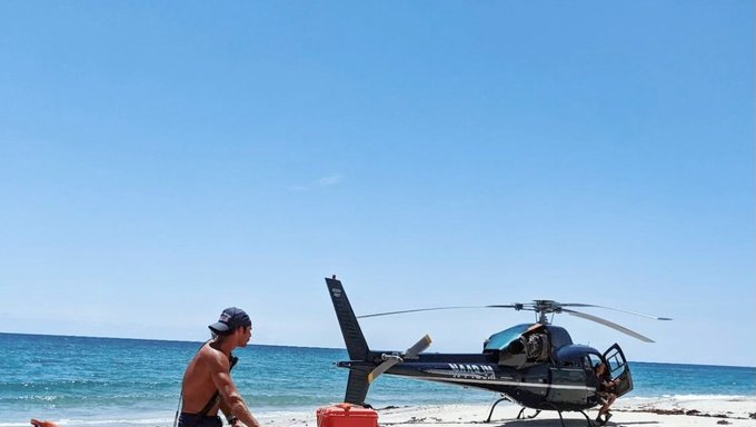 Helicopter lands on Florida beach 'unexpectedly'