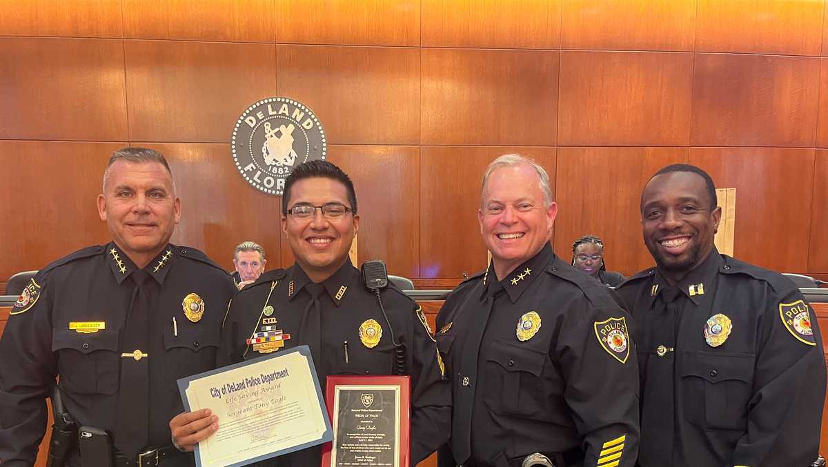 DeLand police sergeant awarded medal for rescuing child at beach