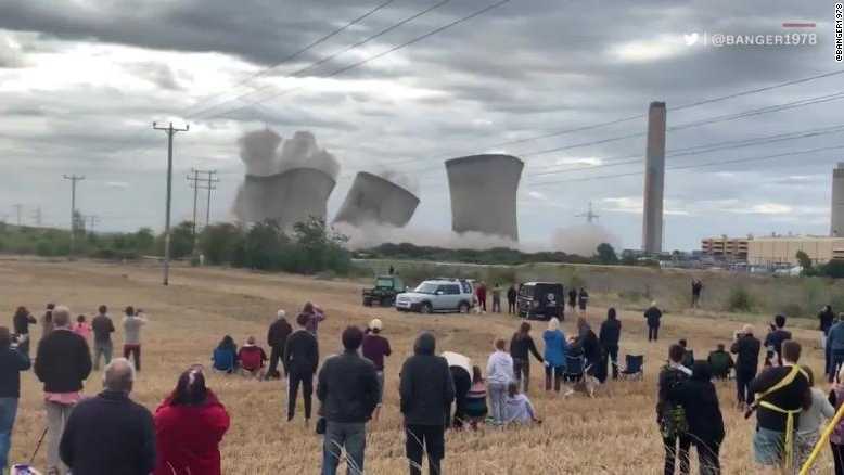 Massive cooling tower implosion comes with unexpected light show