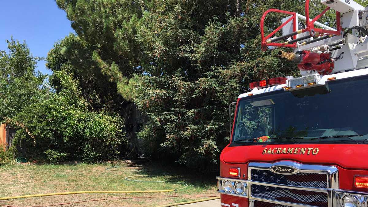 Heavy smoke, flames reported as crews battle home fire