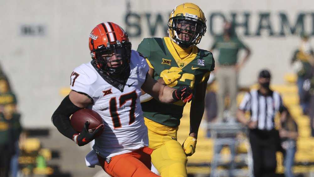 Stoner catches 3 TDs in Oklahoma State's 42-3 win at Baylor