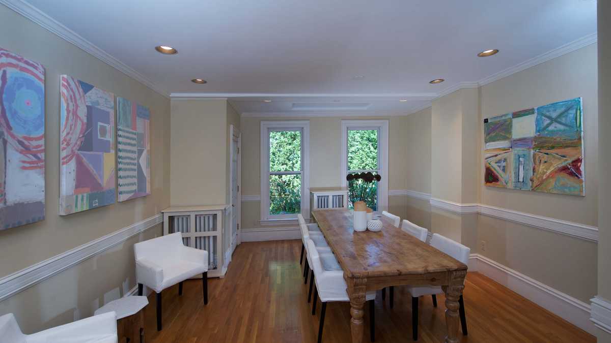 $4.25M Notable stucco colonial revival sits on most desirable street