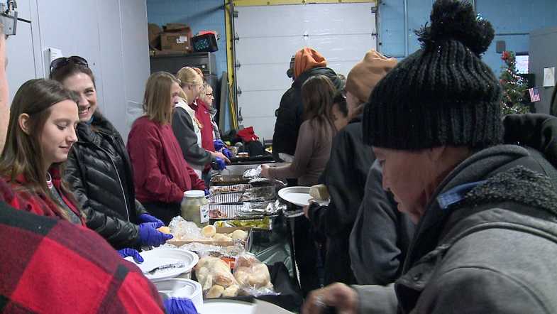 Homeless, families in need treated to Christmas dinner party