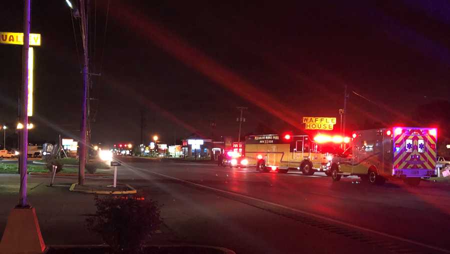 Police: Woman fatally hit by truck while crossing Dixie Highway