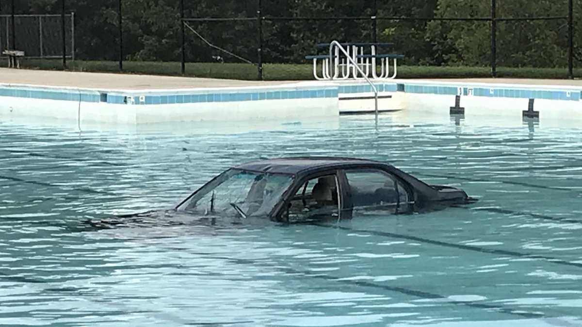 Driving lesson ends with car in pool
