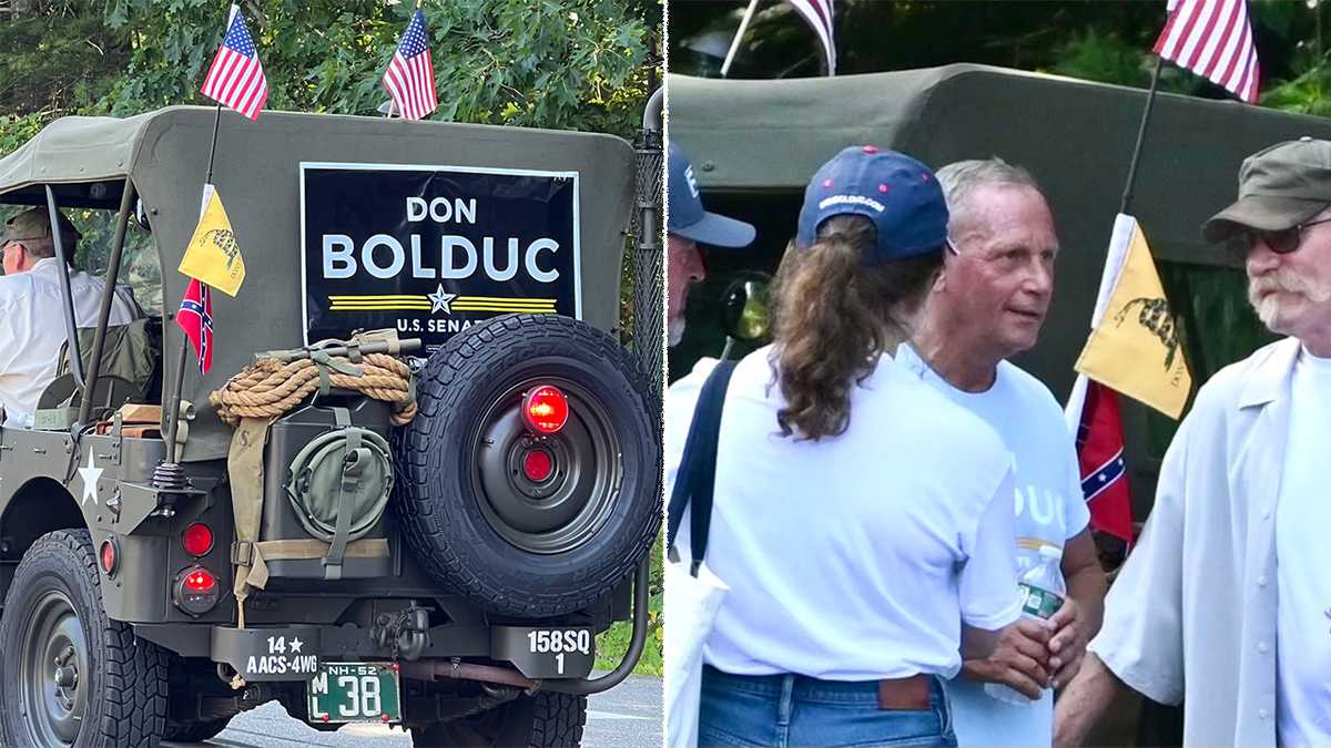 Confederate flag shown near Don Bolduc campaign sign at parade