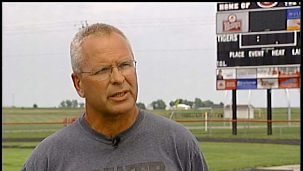 Coach charged with assault in incident at high school