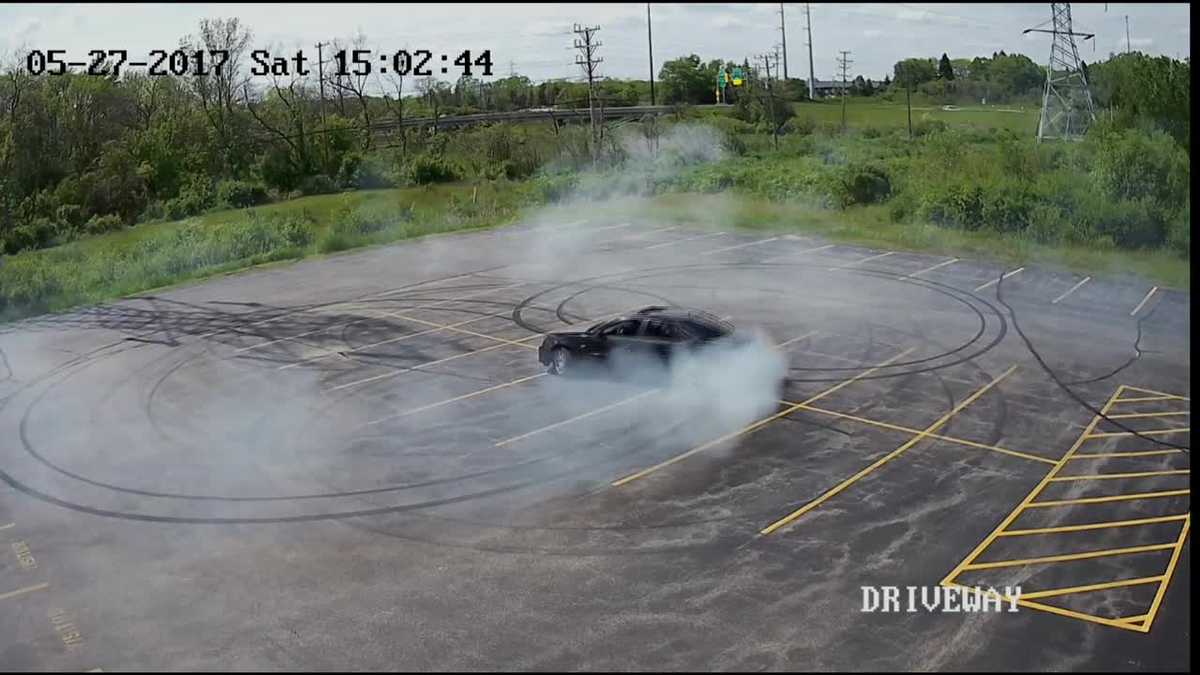 Surveillance cameras capture driver doing burnouts, donuts in ...