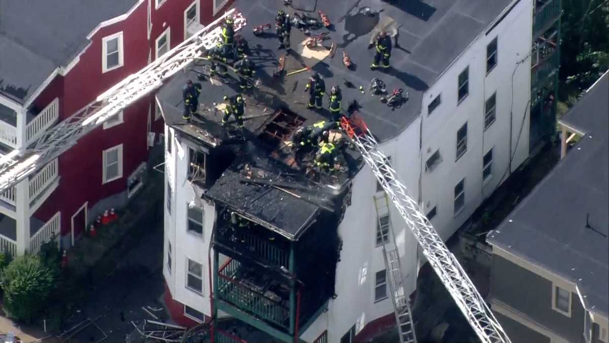 Boston firefighters battle heavy flames, extreme heat in triple-decker ...