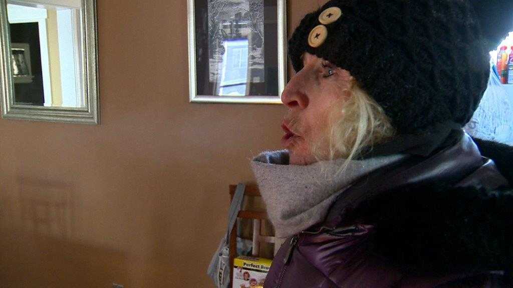 Homeowner struggles with flooded, frozen basement
