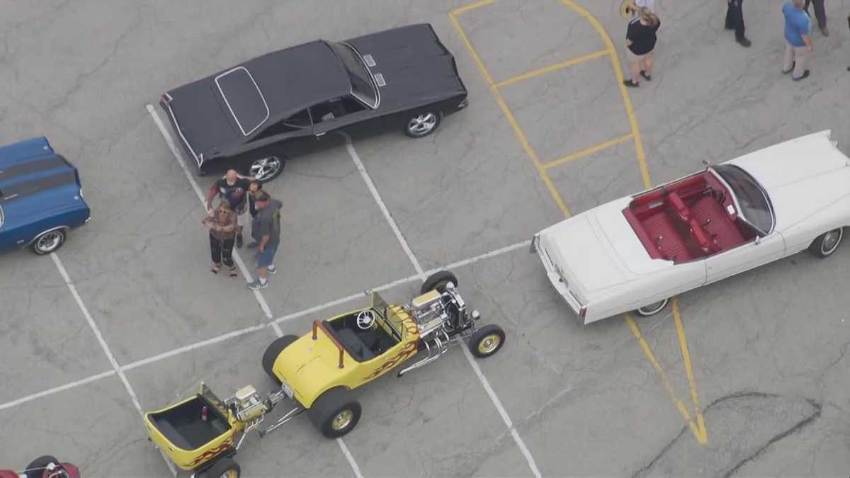 Dozens of vintage street rods parade through Louisville