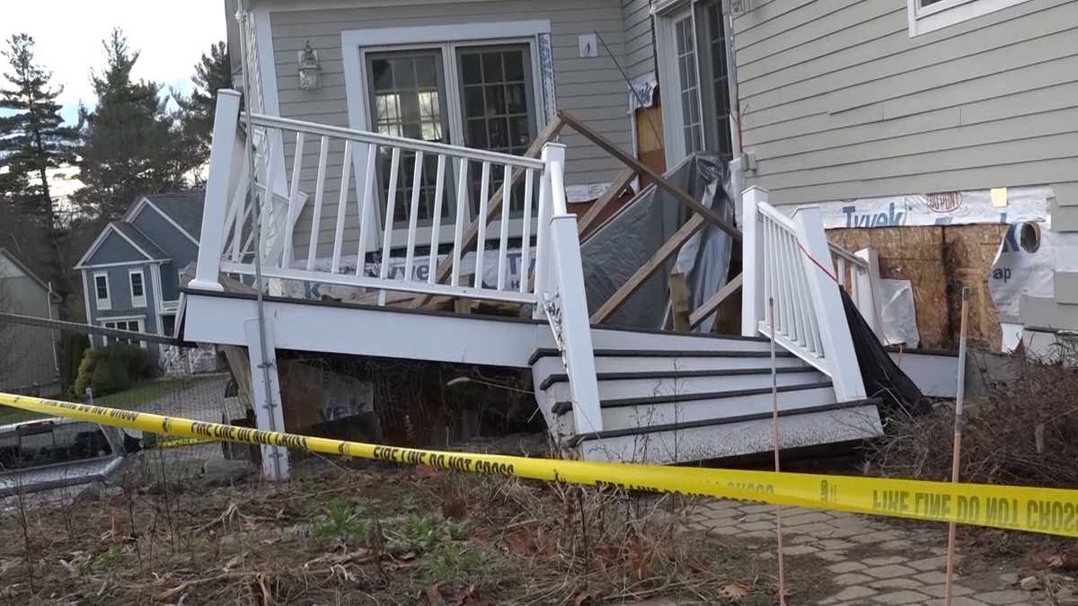 Man trapped after deck collapses at Dracut home, neighbor says