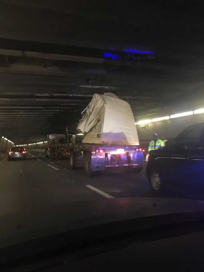 Truck slams into ceiling inside O'Neill Tunnel, causing major traffic ...