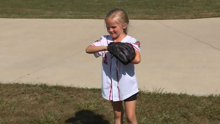 5-year-old girl born without left forearm, hand to throw out first ...