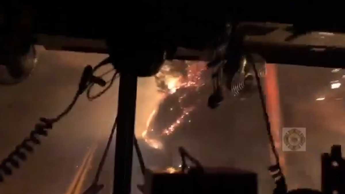 Video: Firefighters drive through Kincade Fire