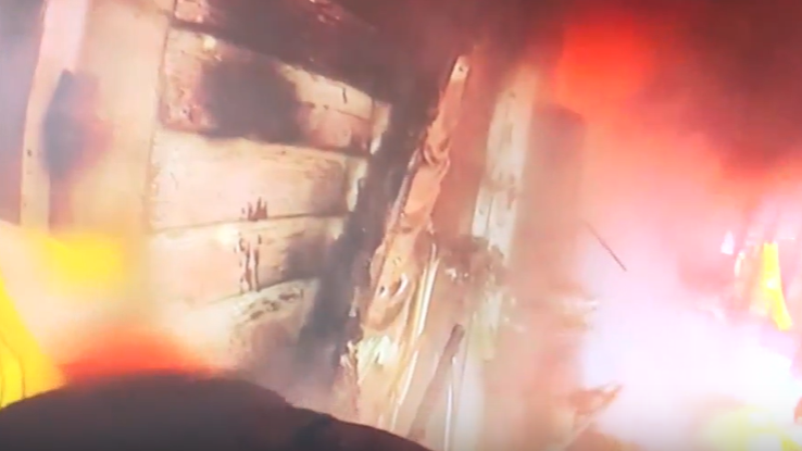 Watch: Williamstown volunteer firefighter rolls out of burning house on ...