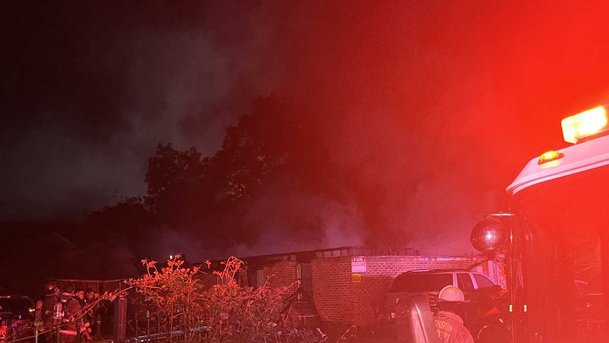 A loud explosion alerted Jackson neighbors to a fire in their community