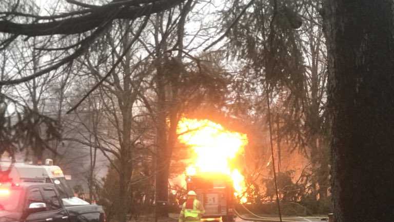 Huge flames shoot into air as gas main fire spreads to house