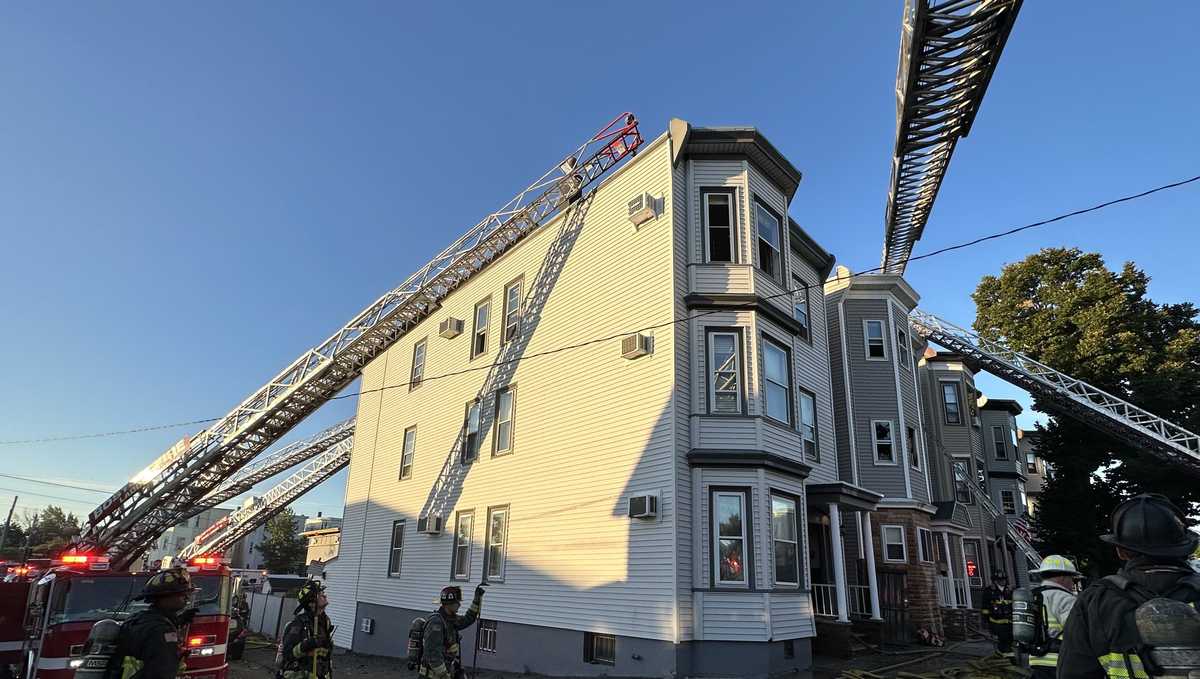 Crews battle 3-alarm fire at 2 triple-deckers in East Boston