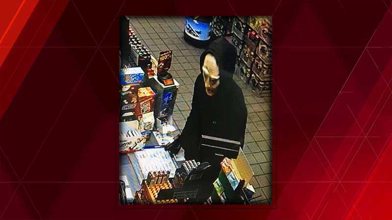 Armed man wearing Halloween mask robs convenience store, police say Armed man wearing Halloween mask robs convenience store, police say