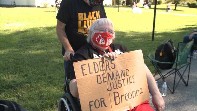 Senior citizens protest on attorney general's lawn, at least 1 arrested