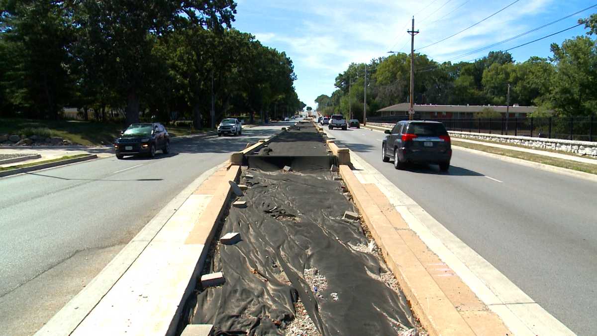 Why are there empty planters along Fleur Drive?