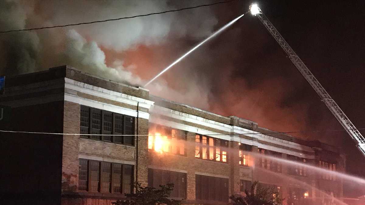 Crews battle massive blaze at old Ensley High School building