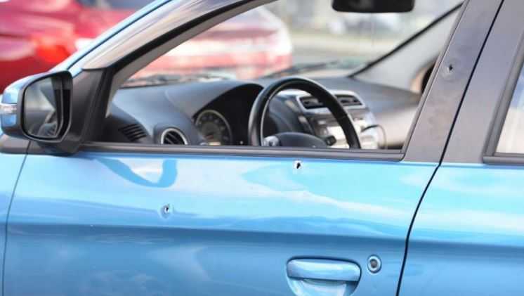 Shooting sends one woman to hospital in bullet-ridden car