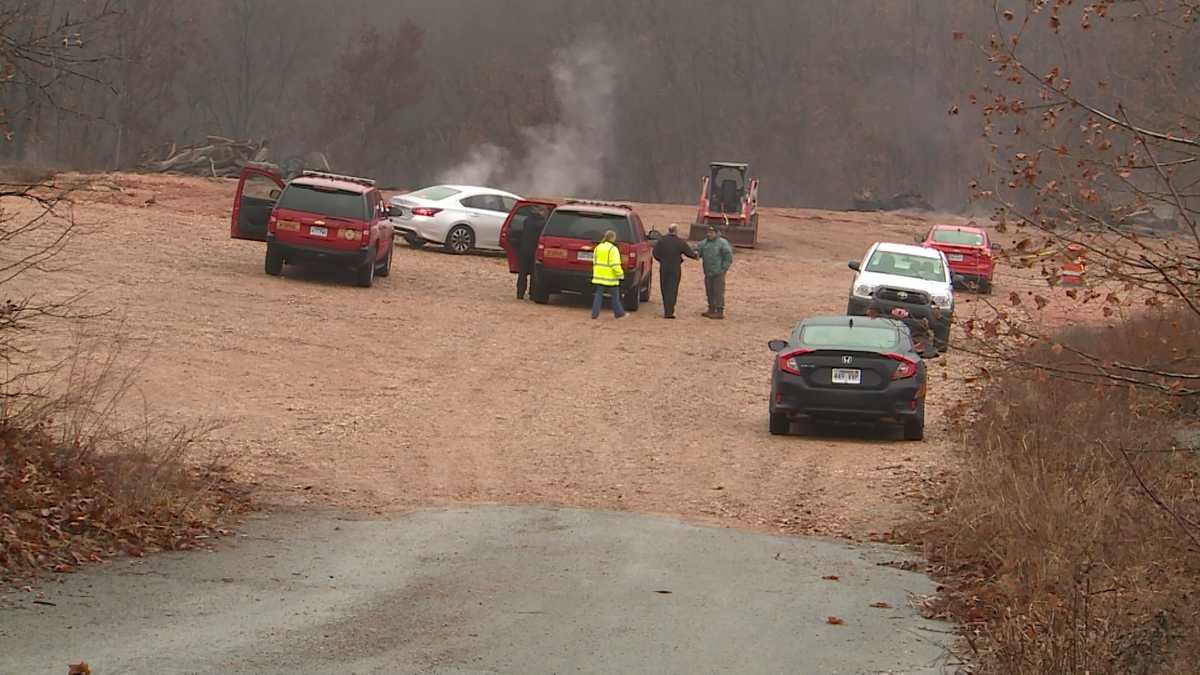 EPA agents tour Bella Vista stump dump; look for ways to put out fire