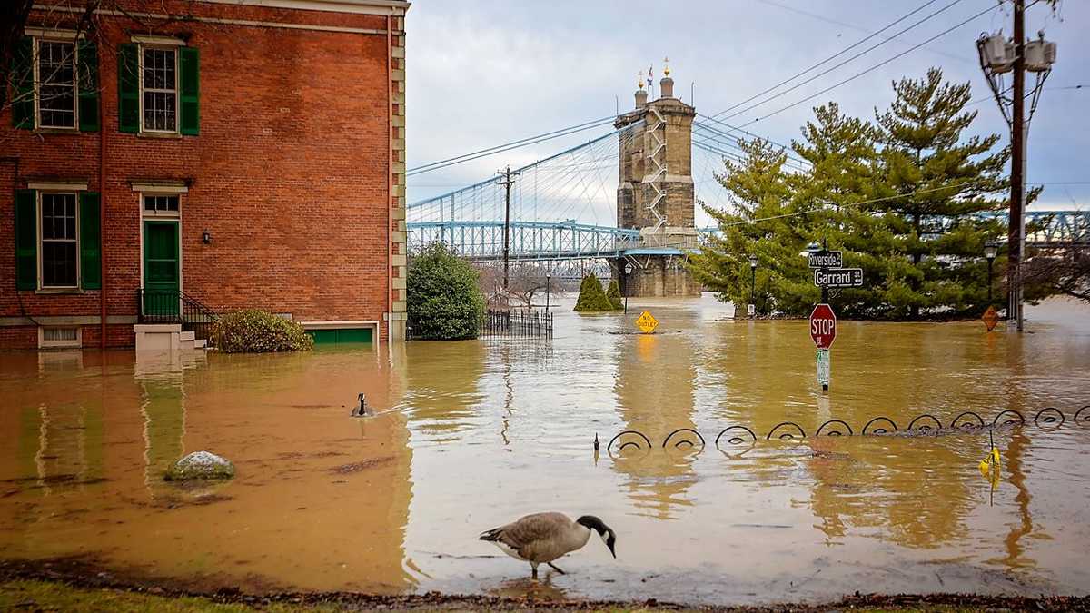 PHOTOS: Ohio River crests, flooding Cincinnati streets, parks